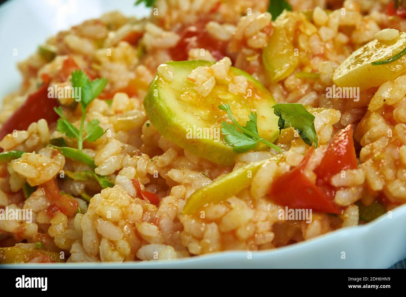 Tomato courgette risotto Stock Photo - Alamy