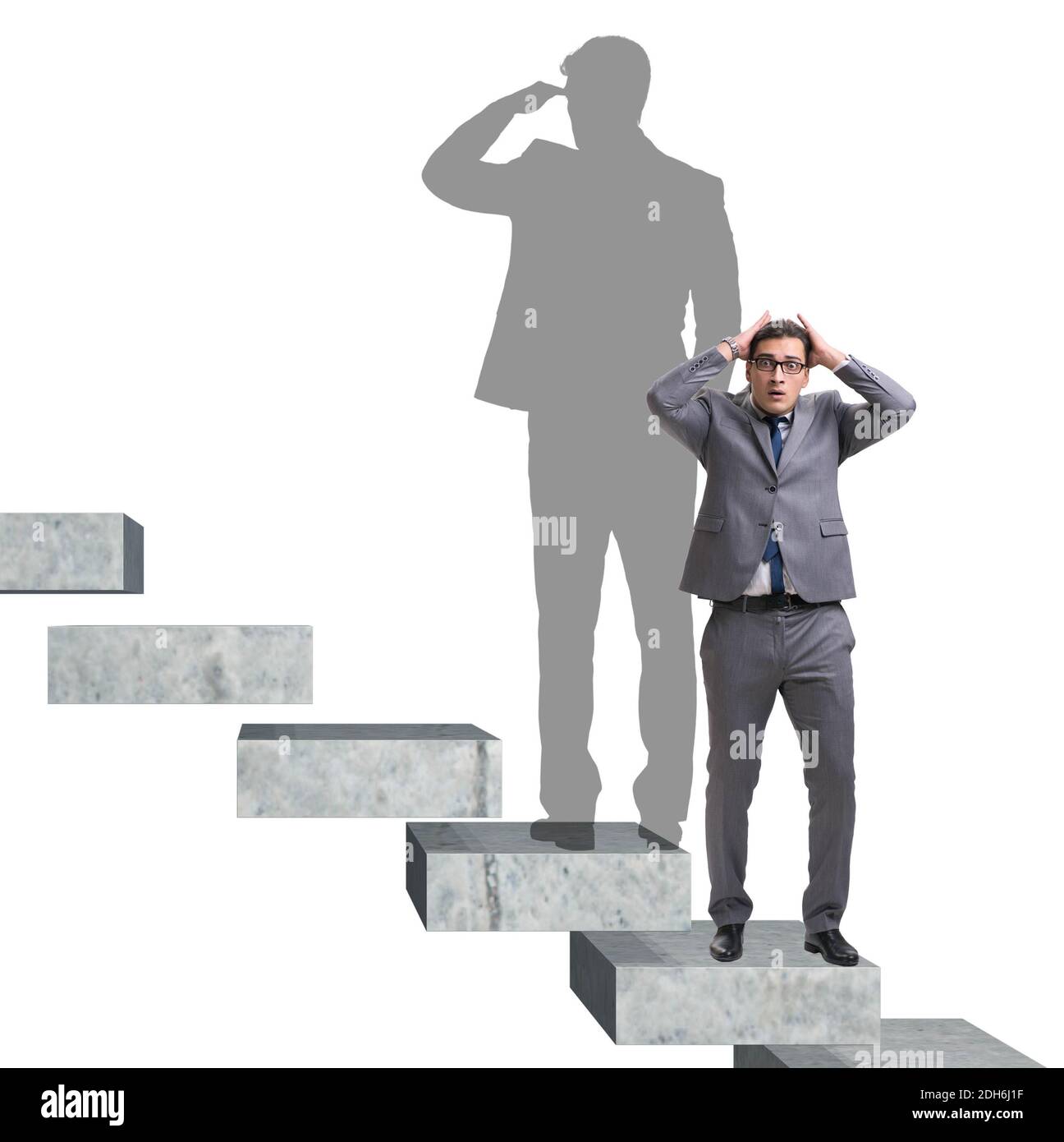 Businessman and his shadow in business concept Stock Photo - Alamy