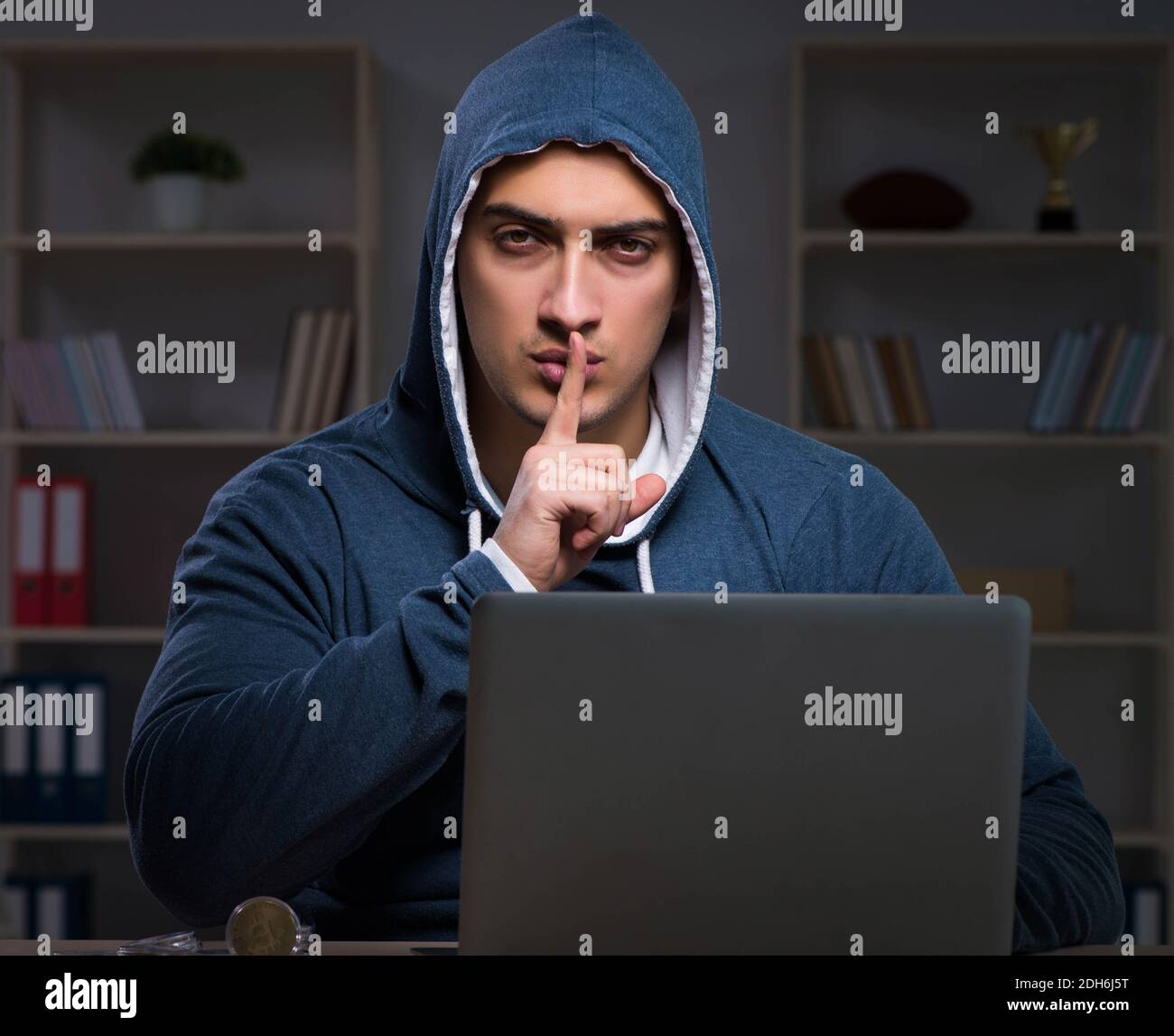 Hacker hacking the data late at night Stock Photo - Alamy