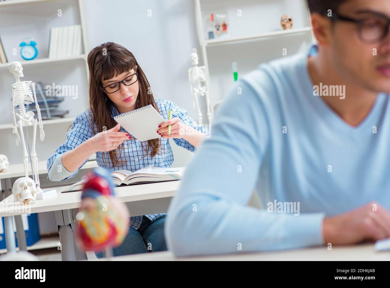 Two medical students studying in classroom Stock Photo - Alamy