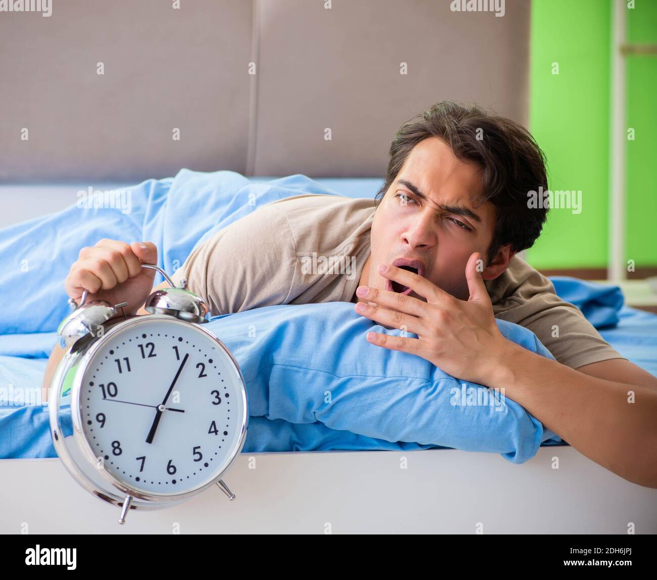 Man having trouble with his sleep Stock Photo - Alamy