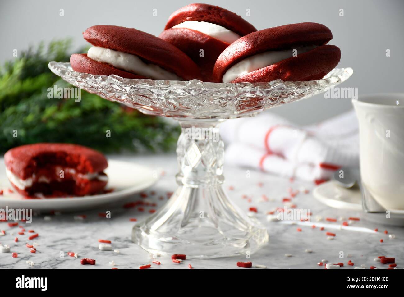 Food photography red velvet moon pies in crystal dish, one bitten from ...