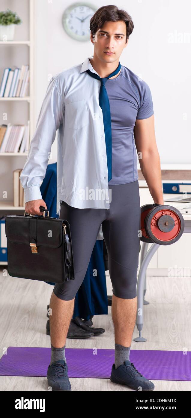Employee combining work and healthy lifestyle Stock Photo - Alamy