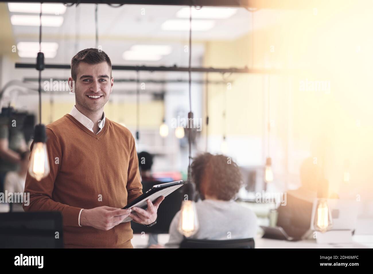 Coworking space businessman portrait Stock Photo - Alamy