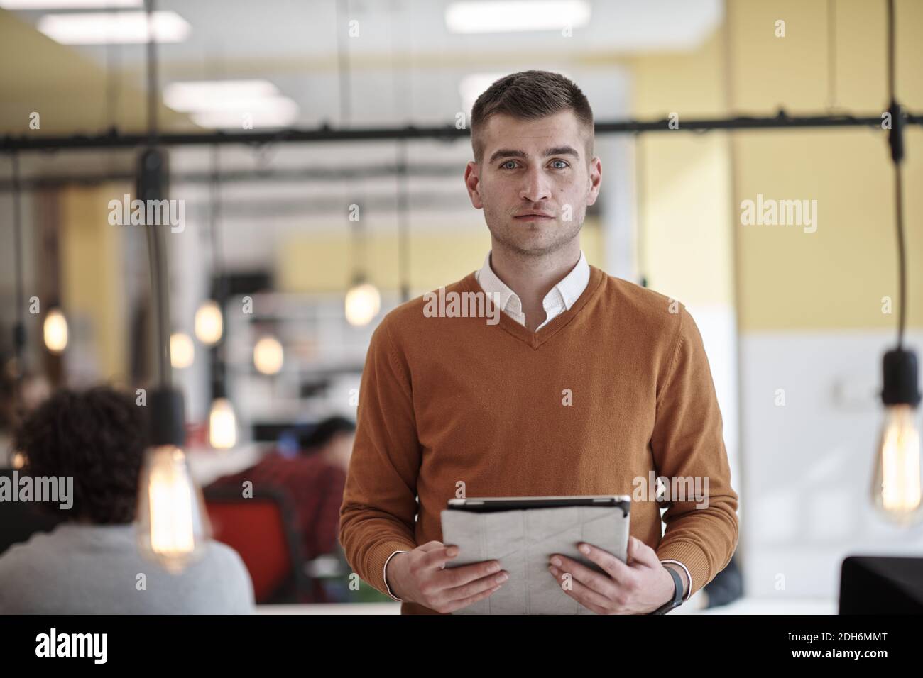 Coworking space businessman portrait Stock Photo - Alamy