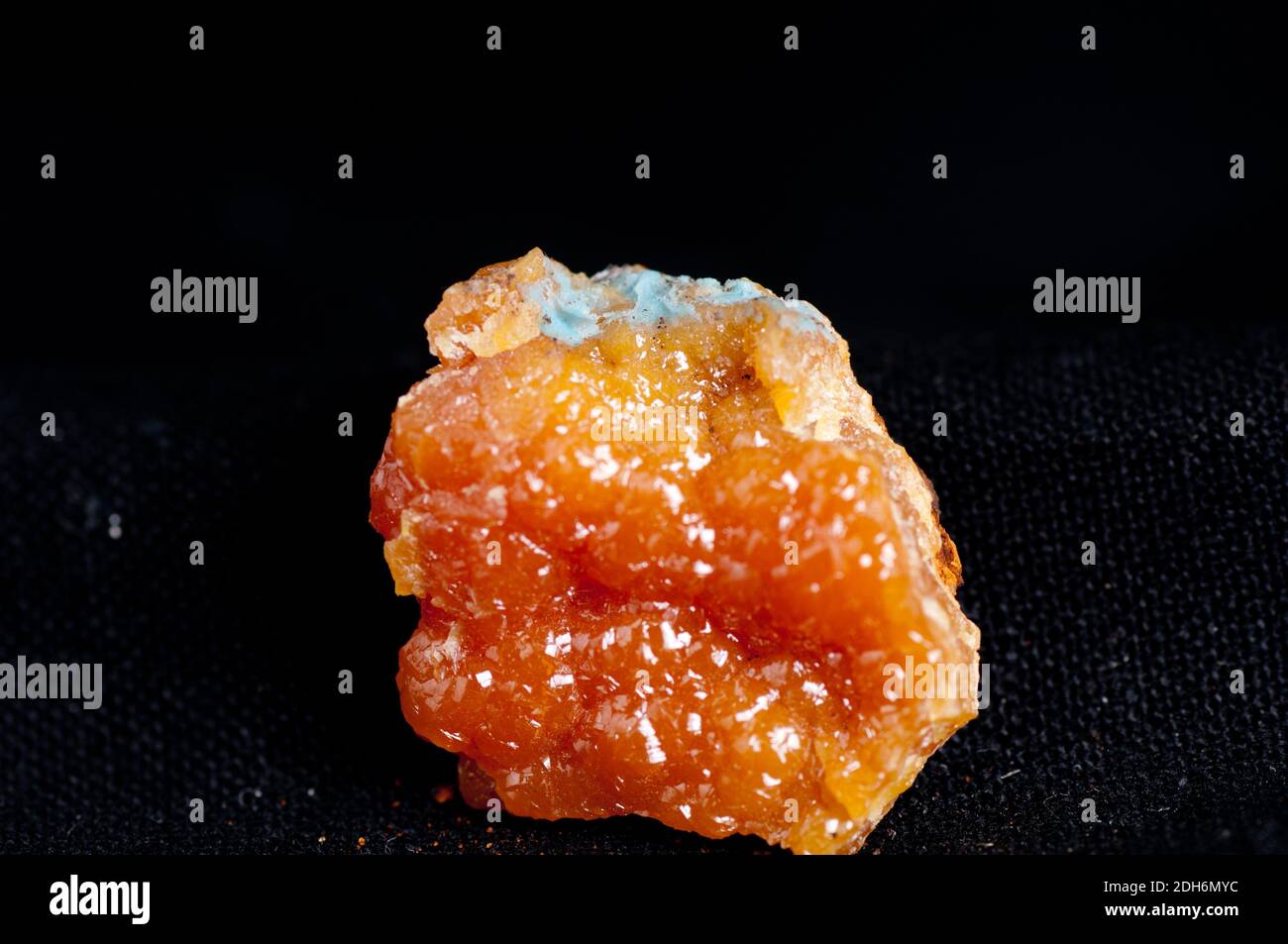 a large orange and green polymorphite mineral sample Stock Photo - Alamy