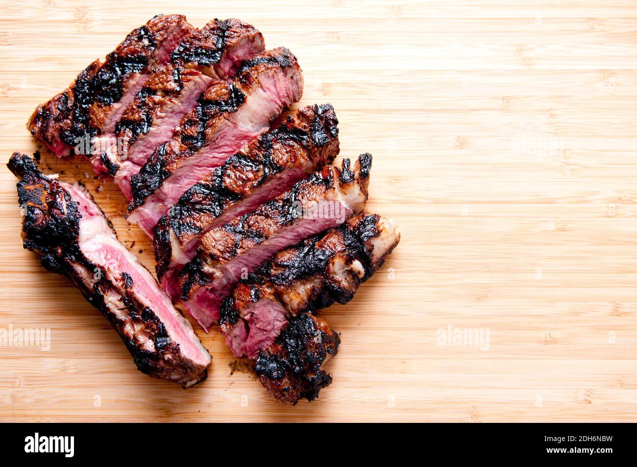 a rare rib steak cooked to perfection on the grill Stock Photo - Alamy