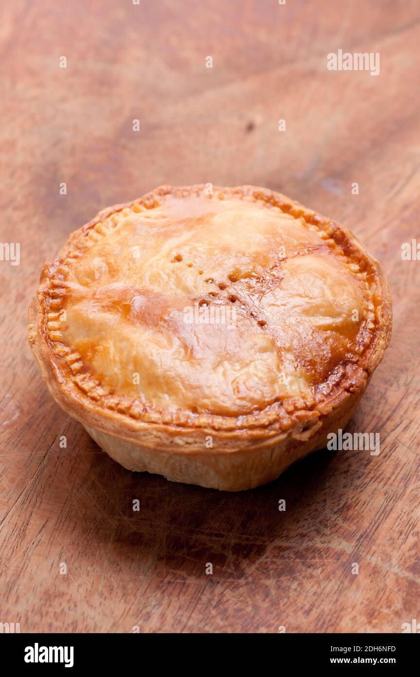 meat pie made with roast beef in a savoury gravy Stock Photo - Alamy