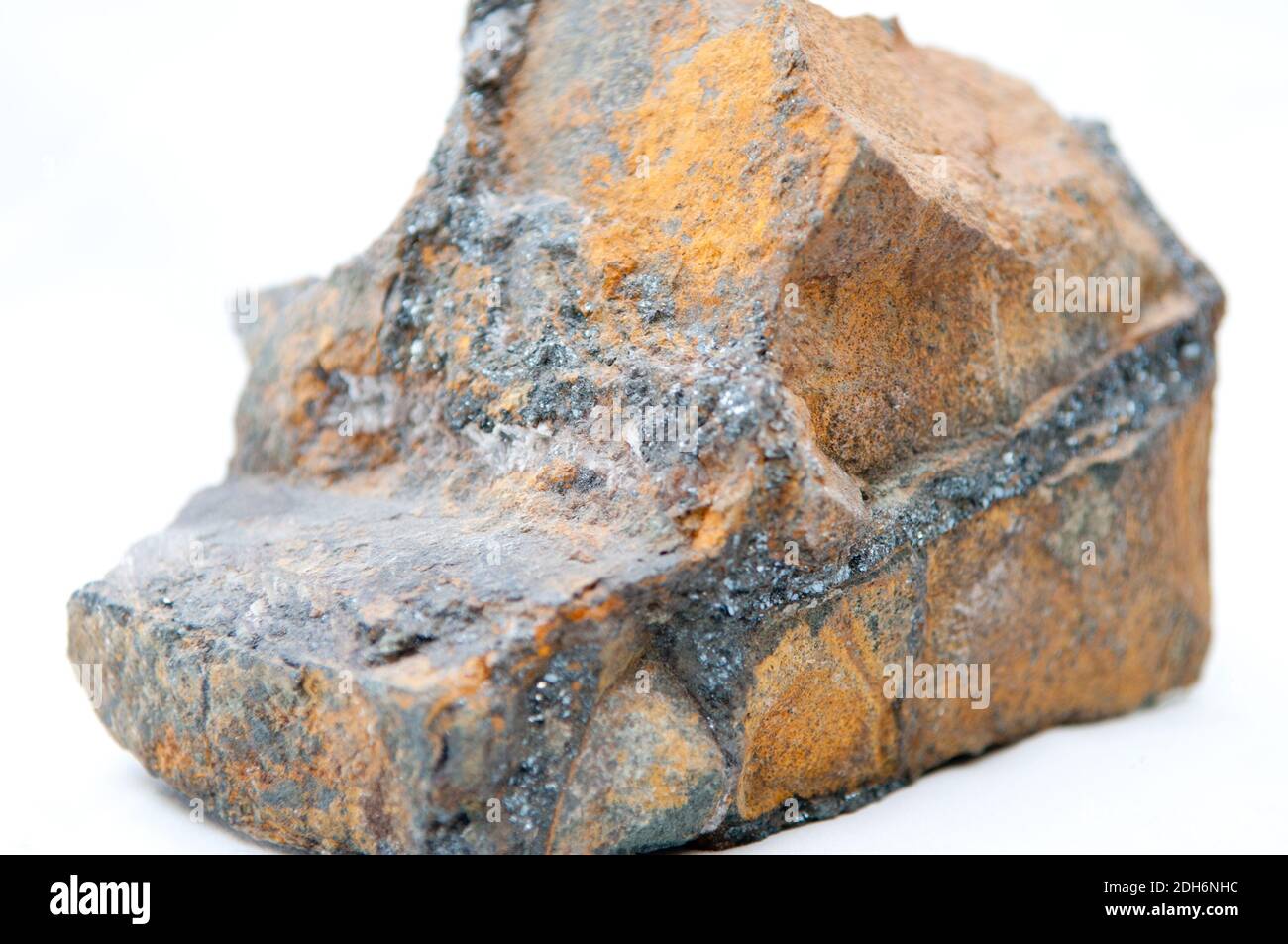gold and hematite mineral sample on a white background Stock Photo - Alamy