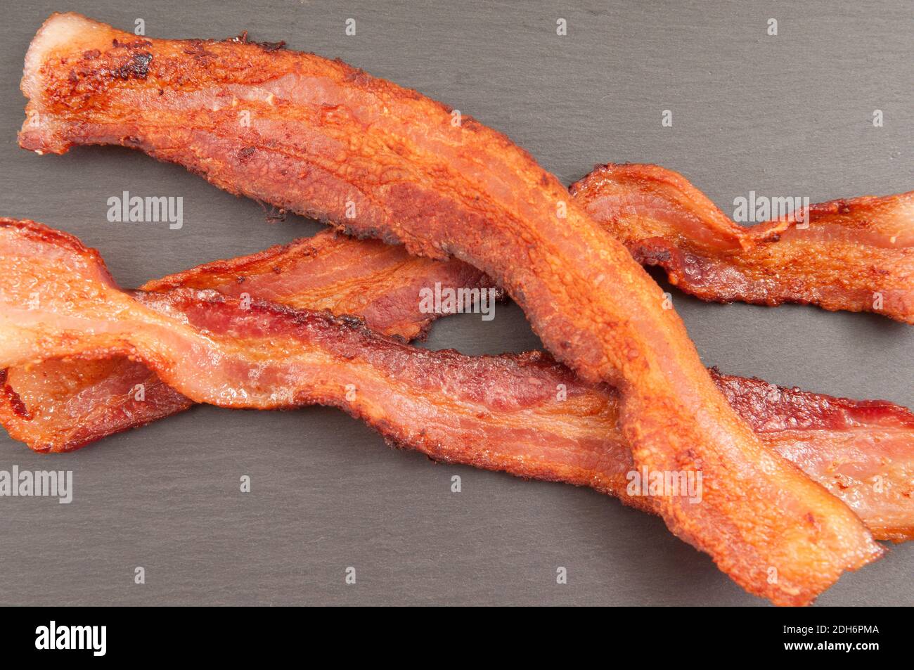 crispy bacon slices makde from local ethically raised pigs Stock Photo ...