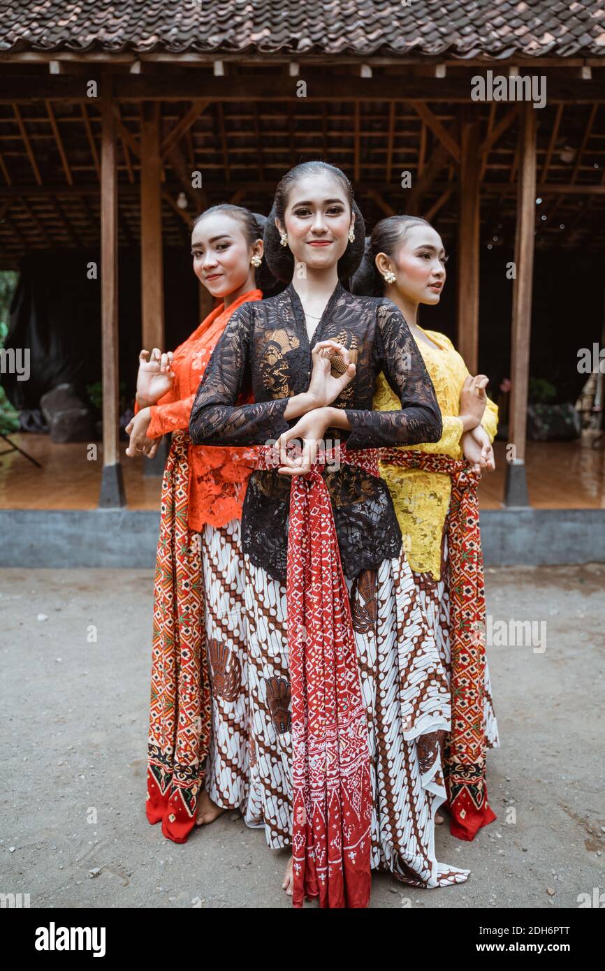 portrait of a young woman wearing Javanese kebaya traditional clothes ...