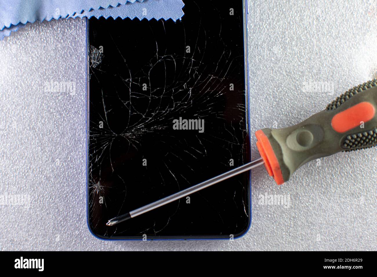 Concept of fixing cell phone screen blurred back Stock Photo - Alamy