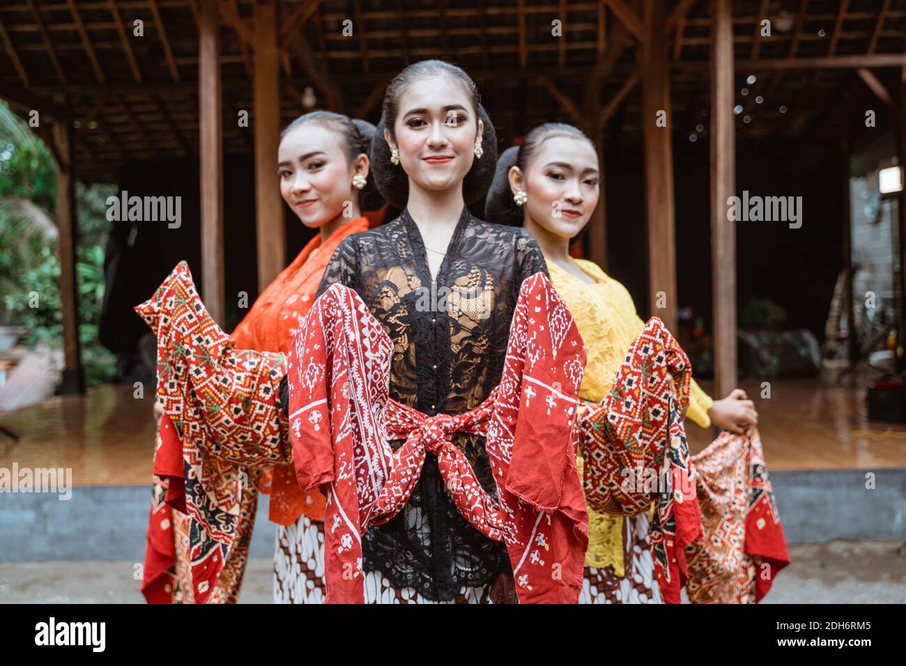 portrait of a young woman wearing Javanese kebaya traditional clothes ...
