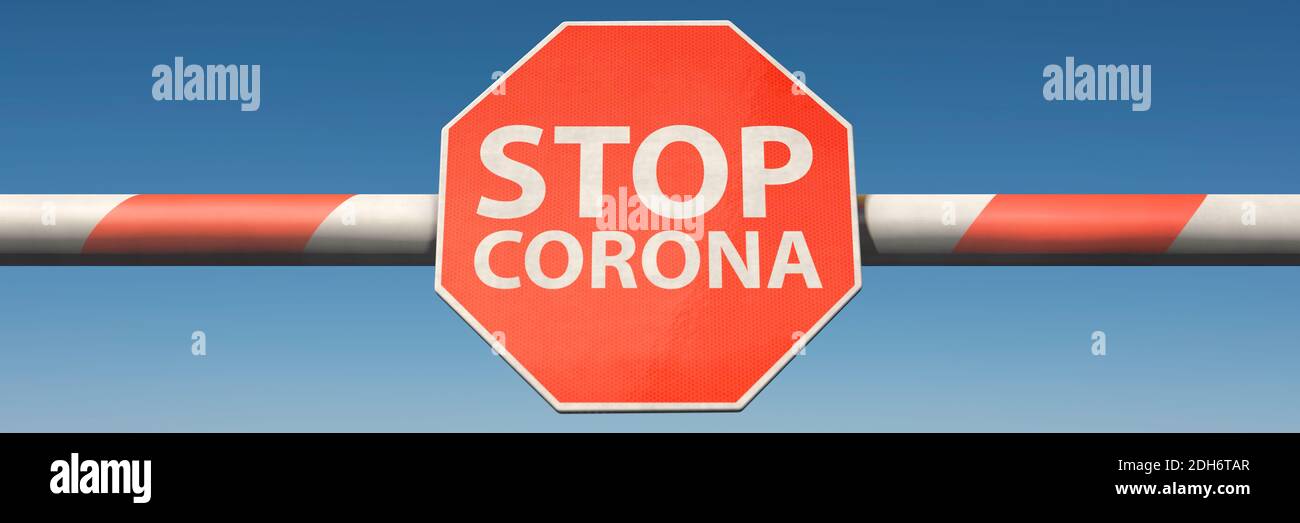 Barrier with sign Stop Corona Stock Photo - Alamy