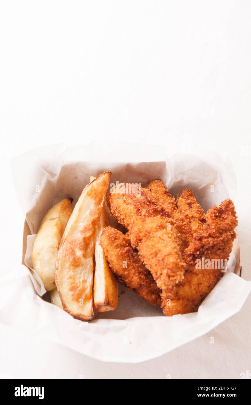Chicken nuggets potato wedges hi-res stock photography and images - Alamy