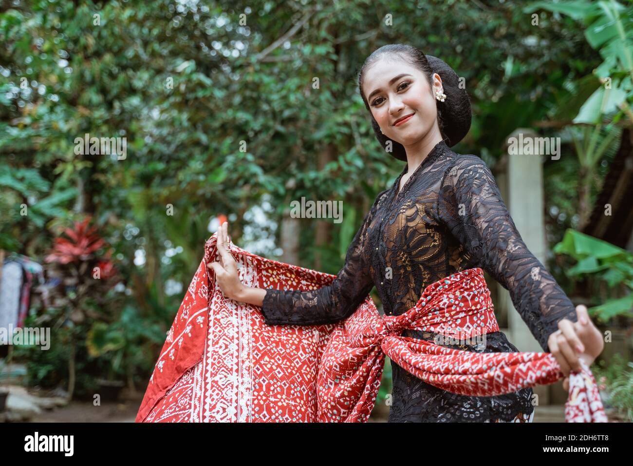 portrait young women presenting traditional Javanese dance movements ...