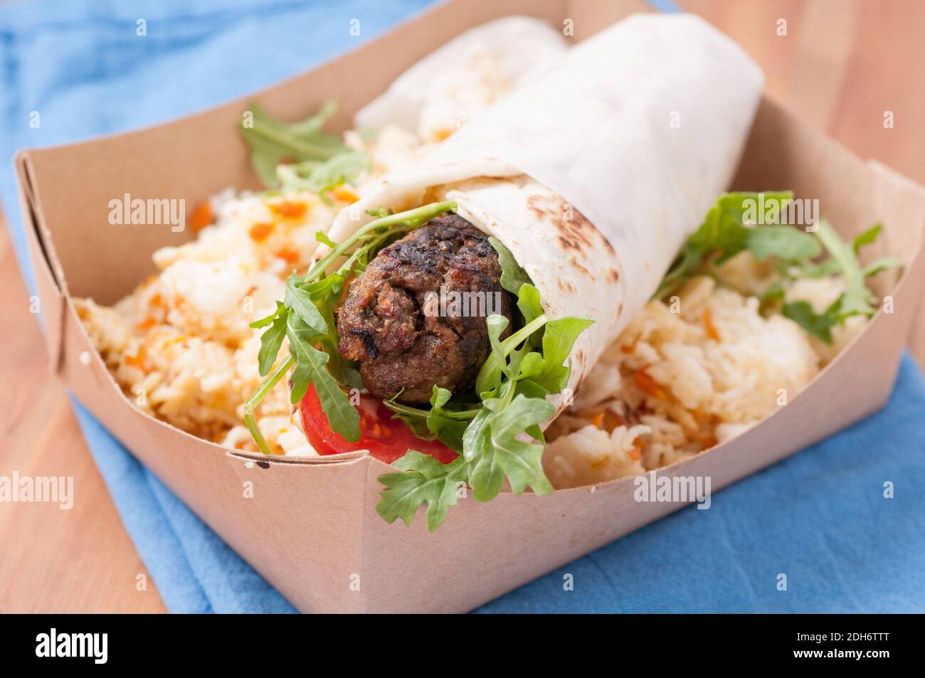 lamb wrap with home made pita and sweet rice Stock Photo - Alamy