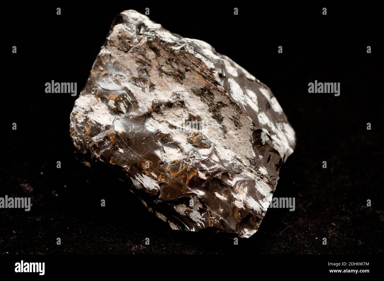 cristobalite mineral sample on a black background Stock Photo - Alamy