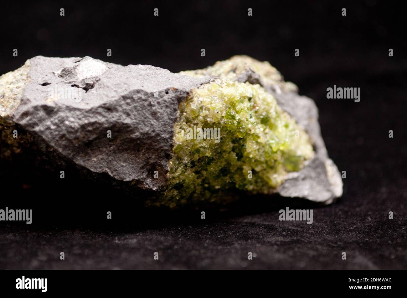 olivine mineral sample with peridot and granite Stock Photo - Alamy