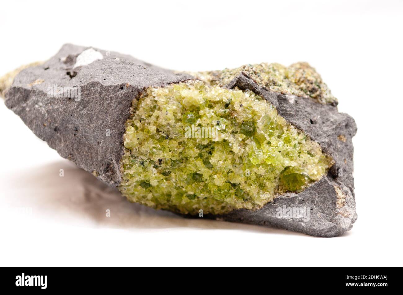 olivine mineral sample with peridot and granite Stock Photo - Alamy