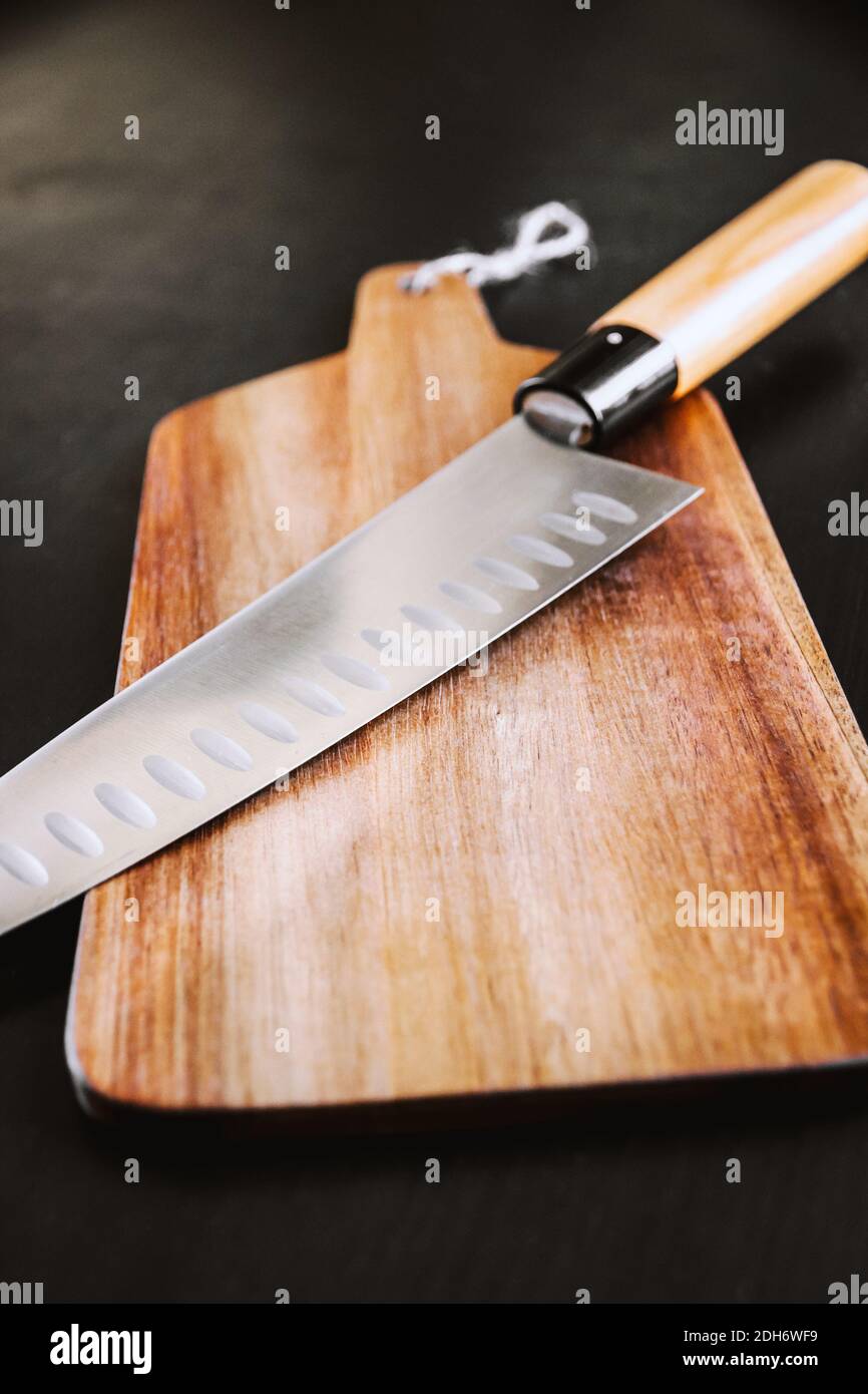 Traditional Japanese gyuto knife on a cutting board Stock Photo - Alamy