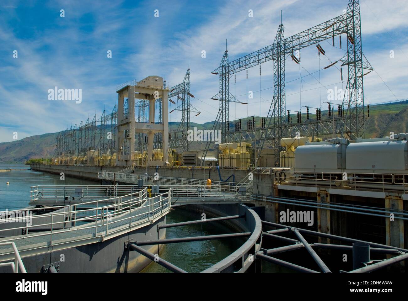 power generating equipment at a large hydro electric dam on a river ...
