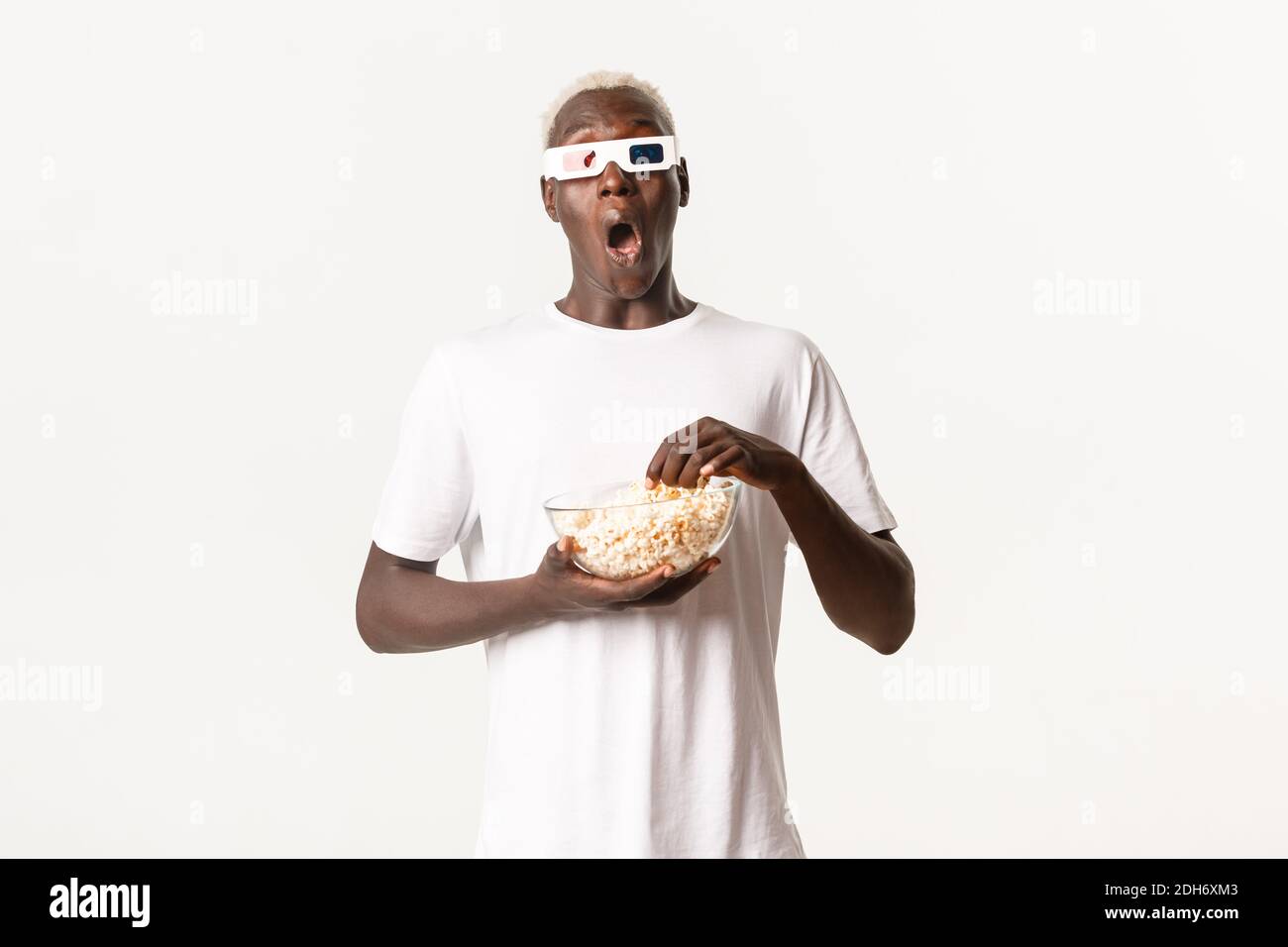 Portrait Of Thrilled Handsome African American Blond Guy Watching Amazing Movie In 3d Glasses