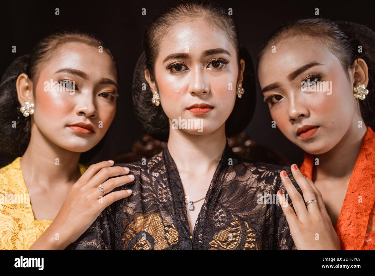 portrait of a young woman wearing Javanese kebaya traditional clothes ...