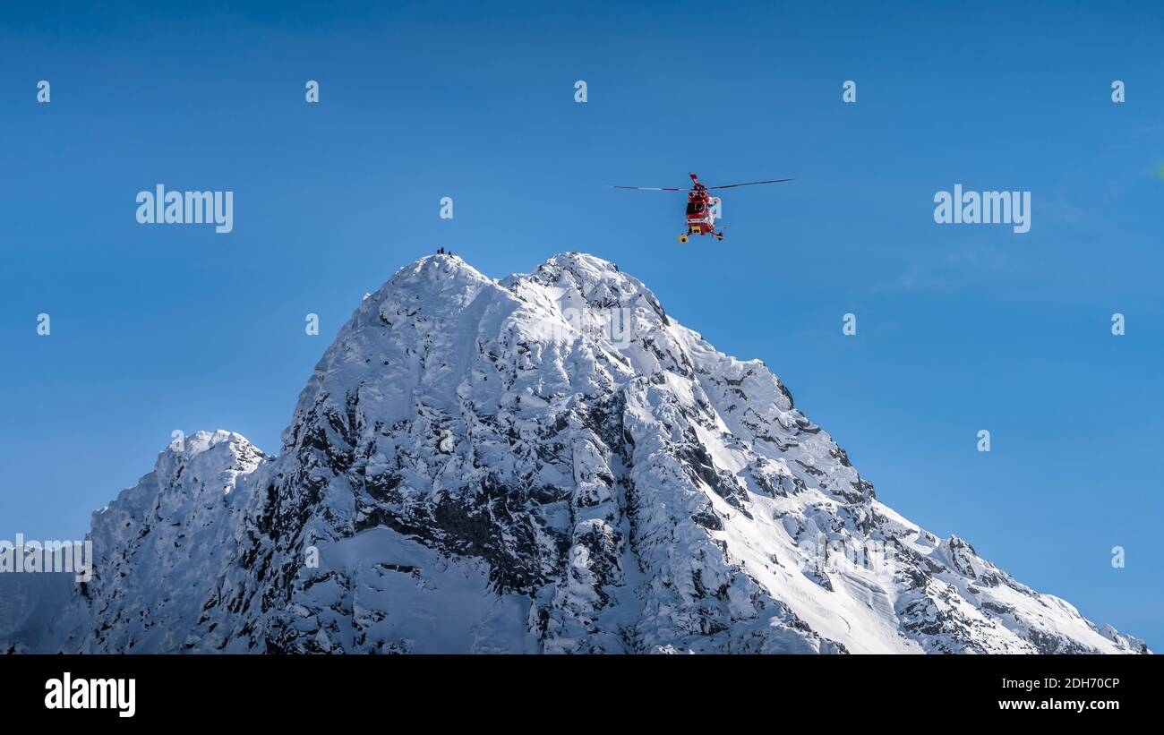 Rescue helicopter saved mountain climbers in Tatra Mountains Stock ...