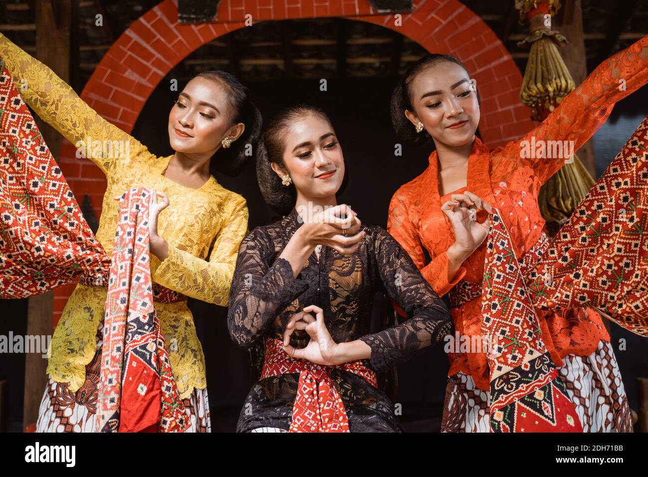 portrait of a young woman wearing Javanese kebaya traditional clothes ...