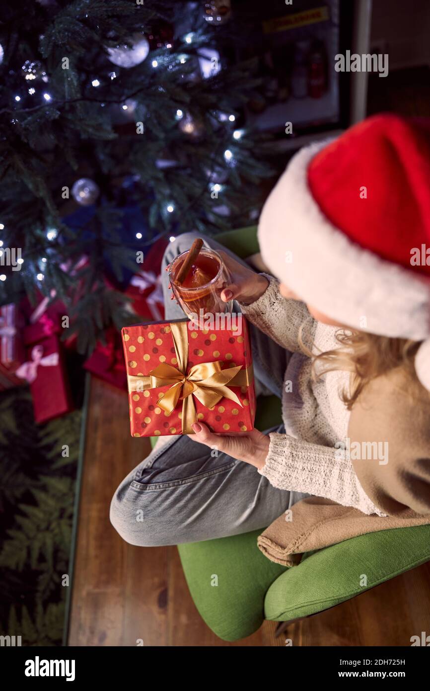 Lady opening box new hi-res stock photography and images - Alamy