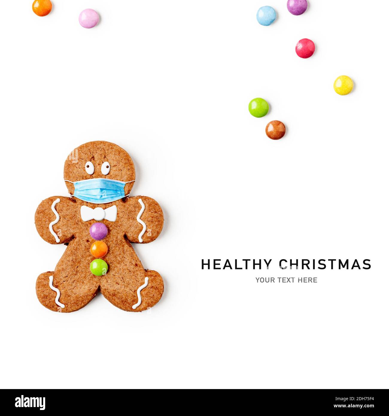 Gingerbread man with medical mask and candies isolated on white ...