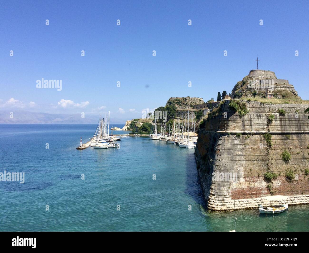 A beautiful view of the light multicolor ocean from the cliff with the ...