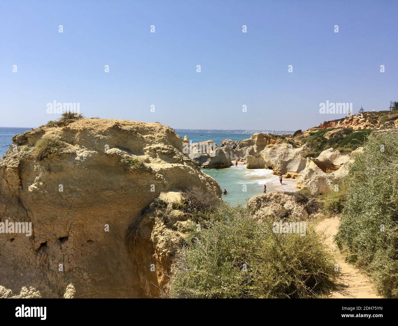 A beautiful view of the light multicolor ocean from the cliff with the ...