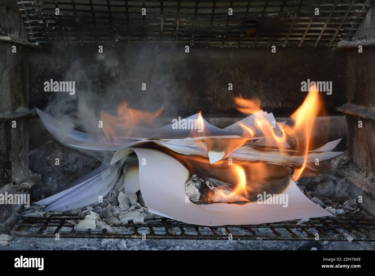 Burning paper documents. Flames and scorched paper. Good example of ...