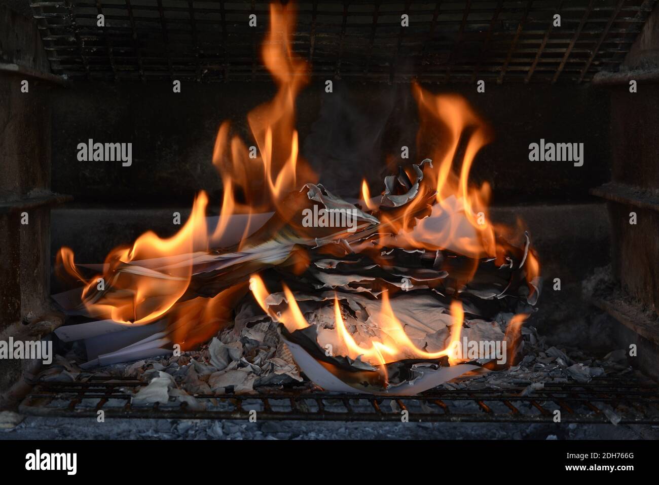 Burning paper documents. Flames and scorched paper. Good example of ...