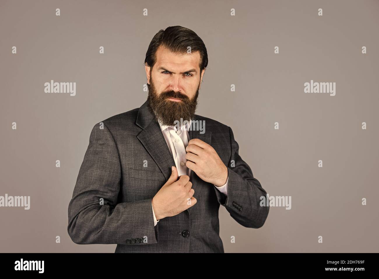 stylish successful man in suit posing. business man wear suit. official ...