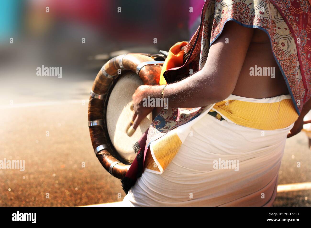 Hindu Drum Player playing Drum IN Stock Photo - Alamy