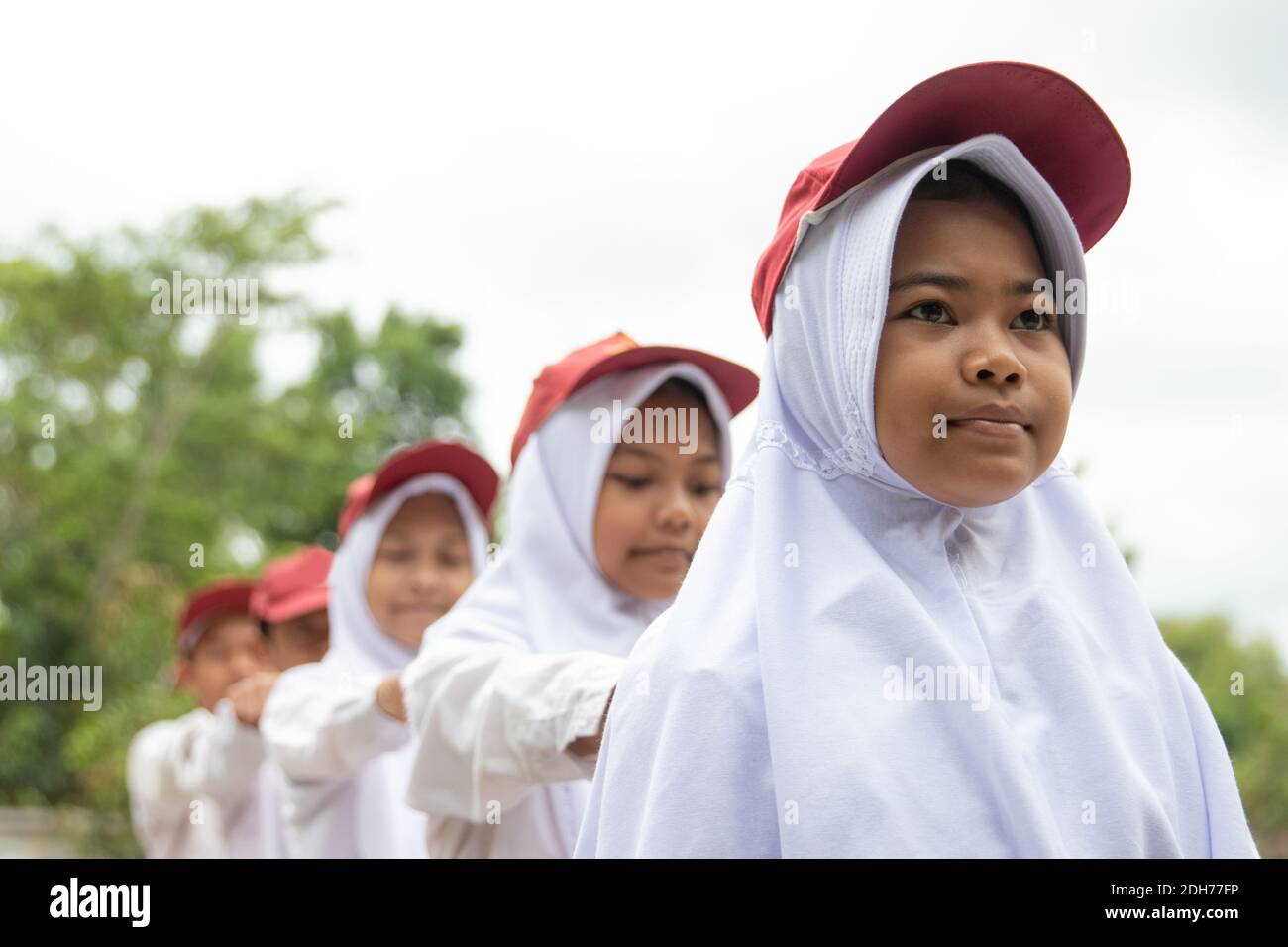 portraits of students arranging for ceremonial flag raising Stock Photo ...