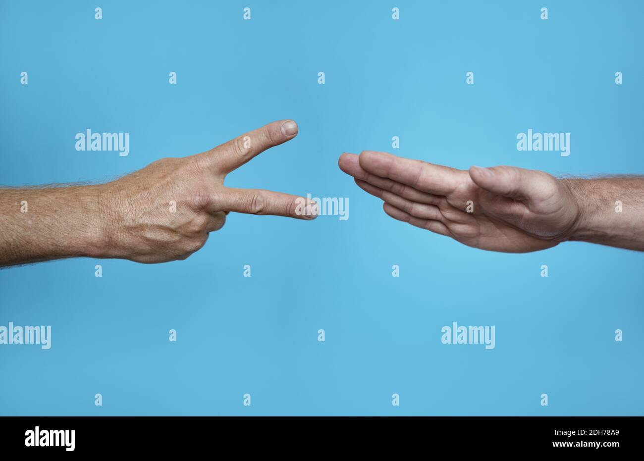 Rock paper scissors hand hi-res stock photography and images - Alamy