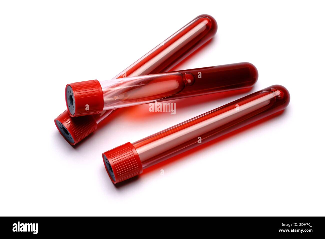Test tube with red plug isolated on white background Stock Photo - Alamy