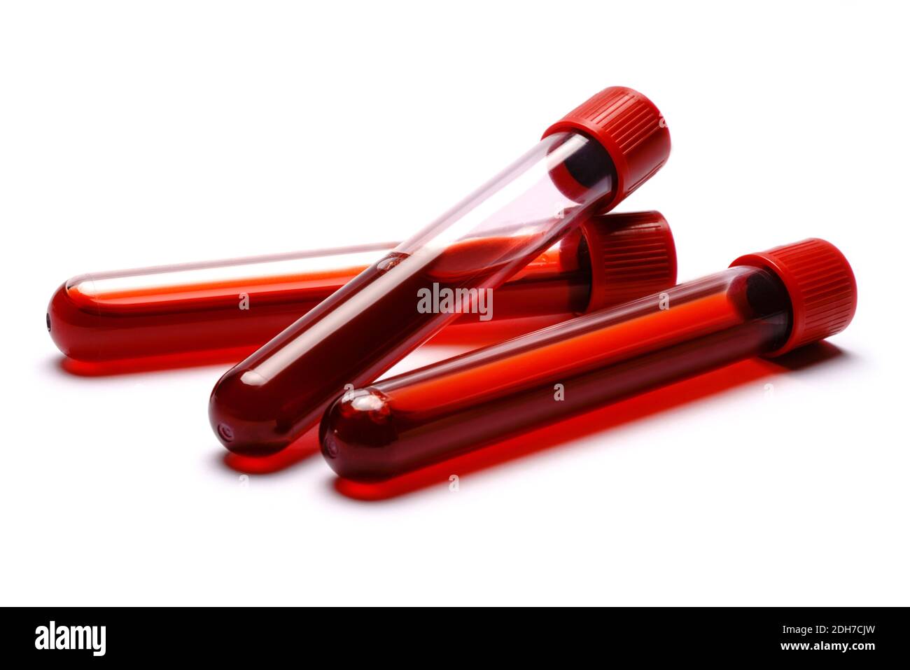 Test tube with red plug isolated on white background Stock Photo - Alamy