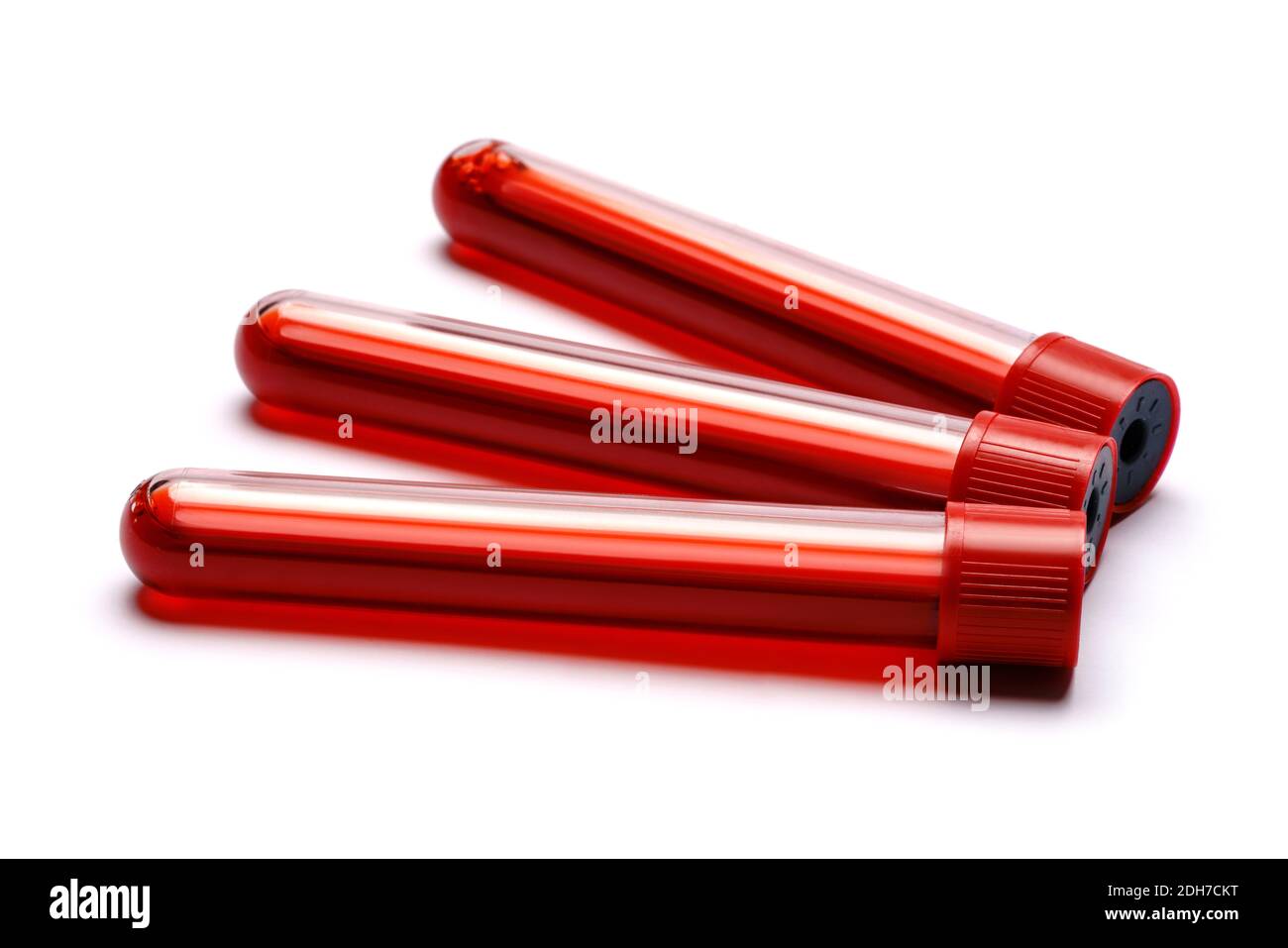 Test tube with red plug isolated on white background Stock Photo - Alamy