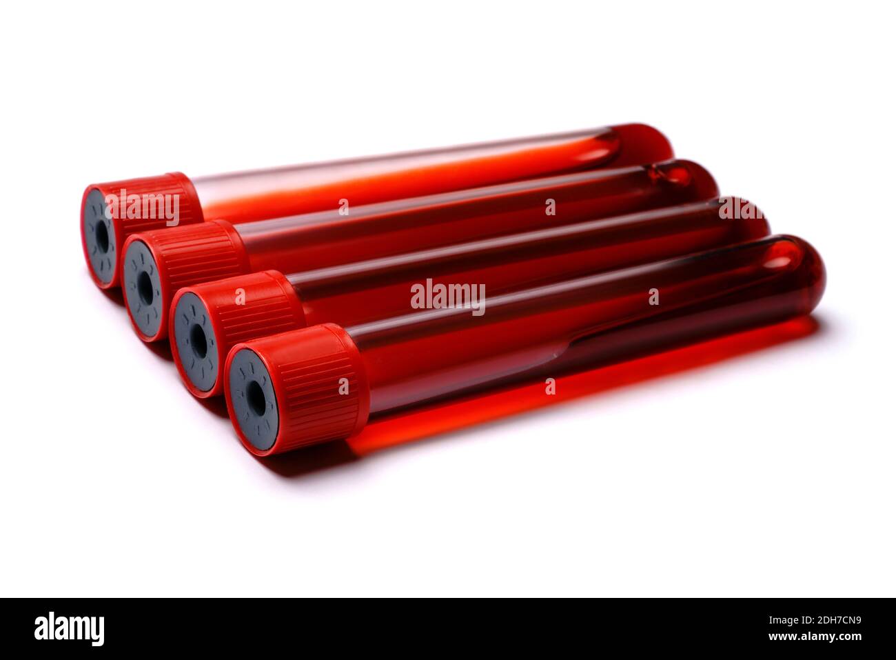 Test tube with red plug isolated on white background Stock Photo - Alamy
