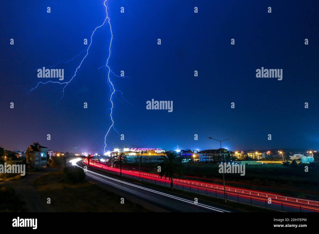 Lightning bolt over town in hi-res stock photography and images - Alamy