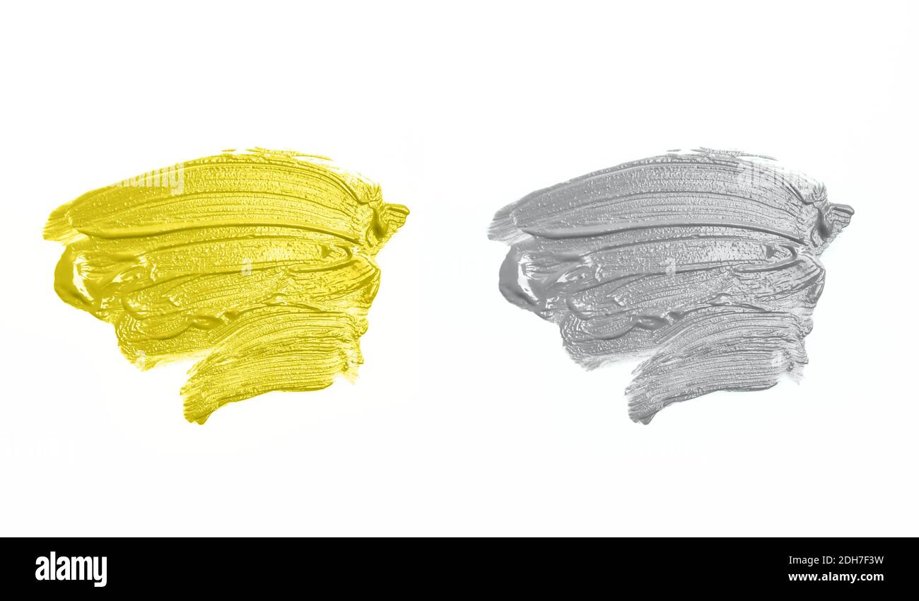 Paint or cosmetics smudges of yellow and gray color isolated on white ...