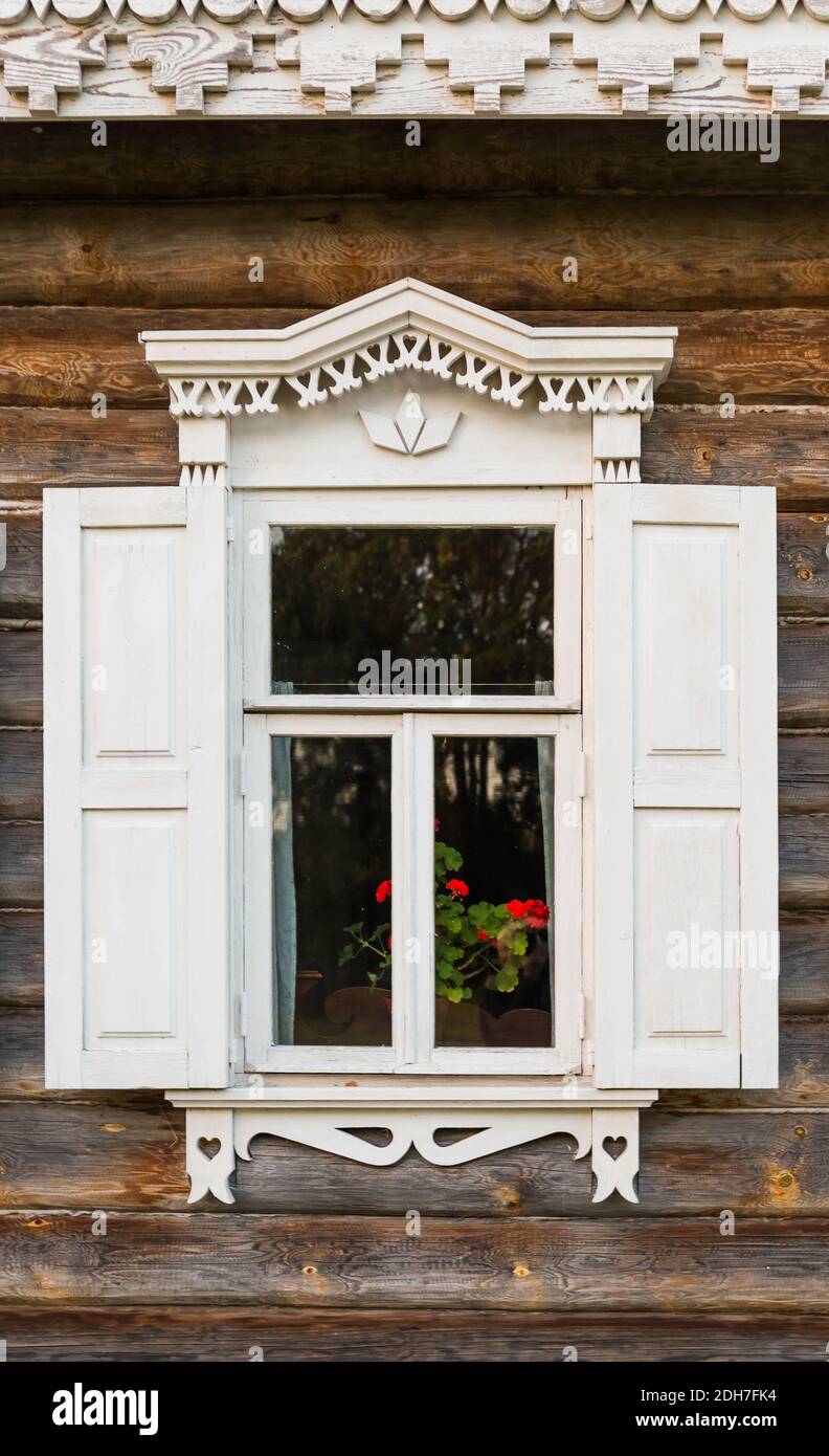 Window of old russian wooden house Stock Photo - Alamy