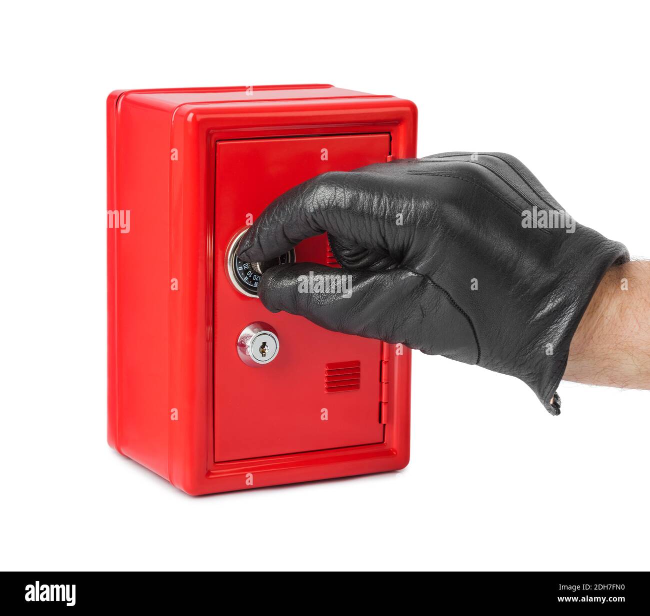 Hand and red toy safe Stock Photo - Alamy