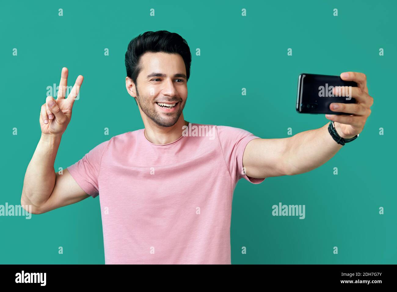 Man making peace sign hi-res stock photography and images - Alamy