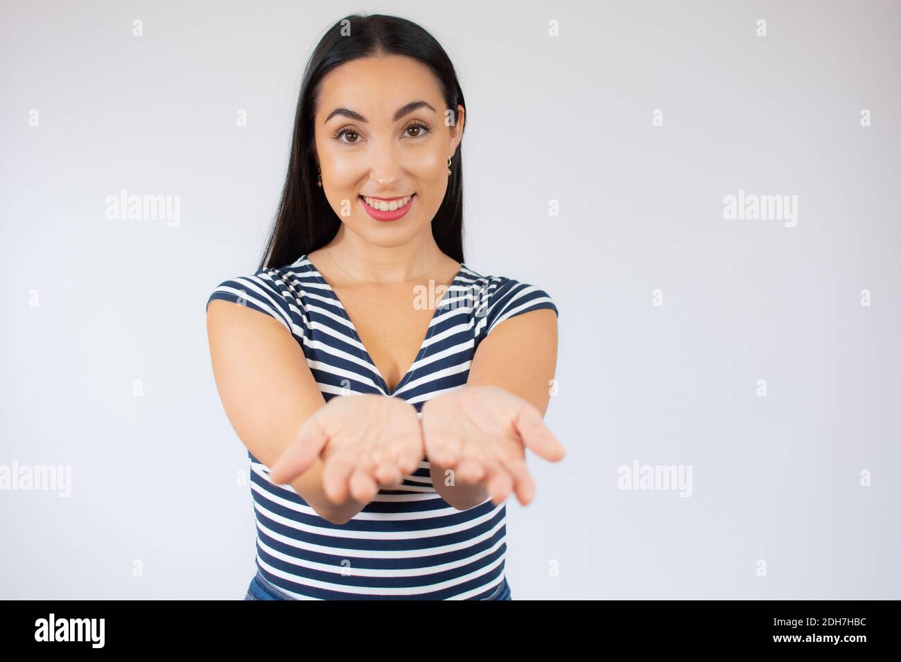 Young Excited Woman Standing Happy Smiling Holding Her Hand Showing